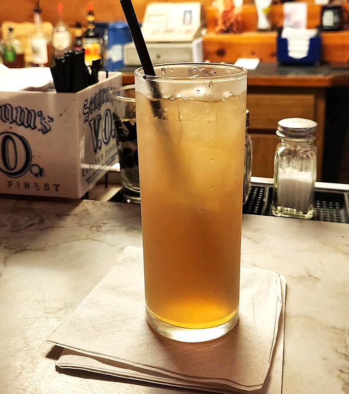 That sweet tea isn't just refreshing—it's Florida's answer to champagne, served tall and proud on a marble bar top.