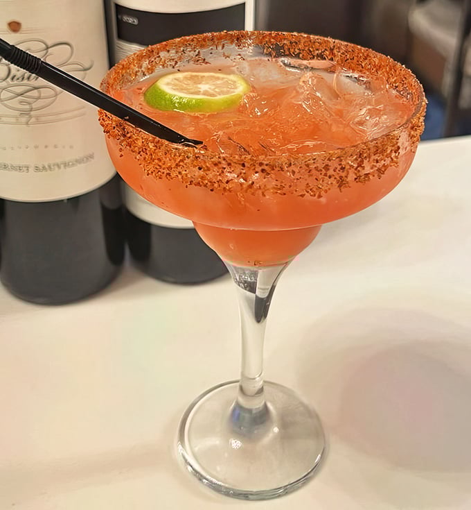 This isn't just any margarita – it's a spice-rimmed flavor explosion that pairs perfectly with seafood. Vacation in a glass.