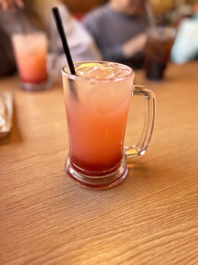 Nothing cuts through barbecue richness like this ruby-hued strawberry lemonade – a sweet-tart refresher served in a mug that means serious business.