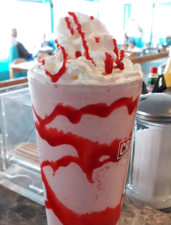 This strawberry milkshake could make even the grumpiest morning person smile – it's basically happiness with a straw.
