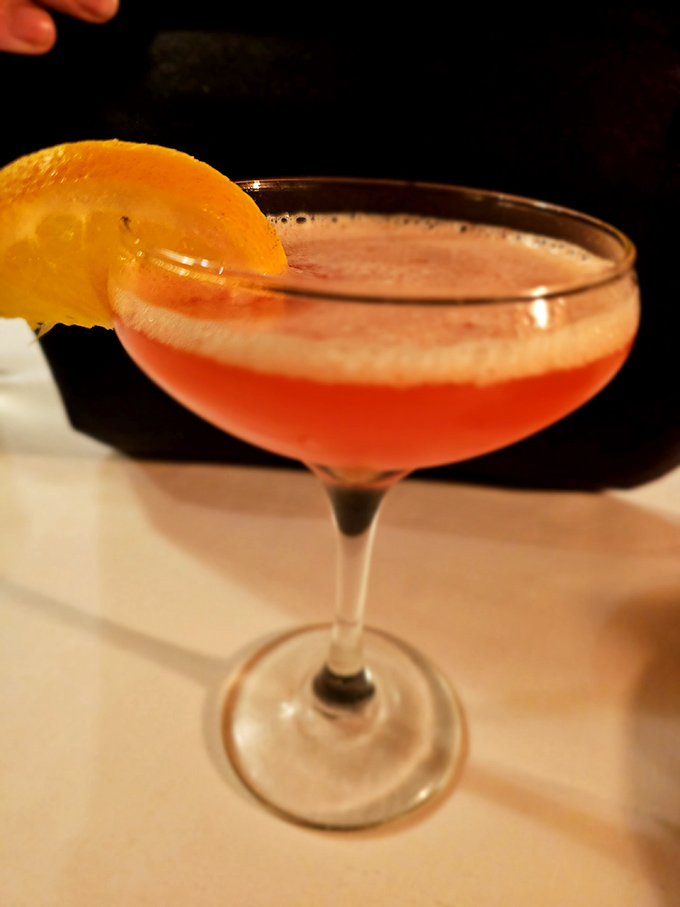 This sunset-hued cocktail isn't just pretty – it's the perfect prelude to a memorable meal or delightful conclusion to a perfect evening.
