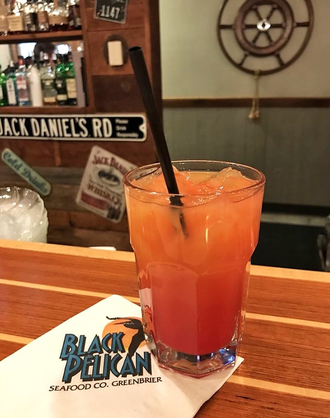 Sunrise in a glass—this vibrant cocktail promises good decisions ahead. The perfect coastal companion for seafood adventures.