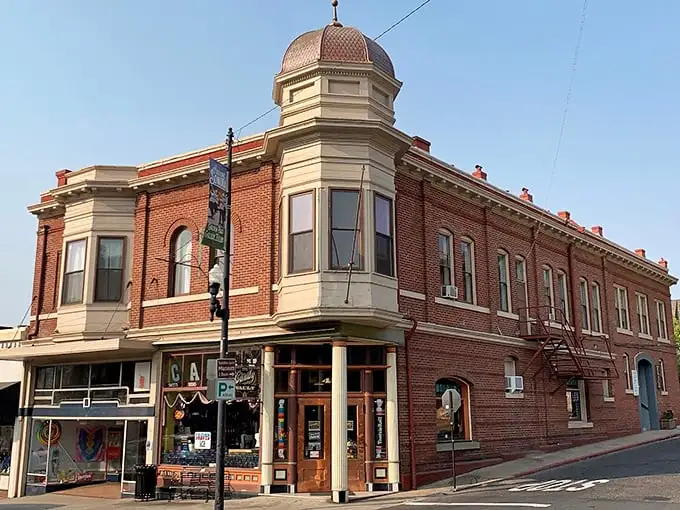 This corner building with its distinctive dome has witnessed generations of Sonora life—if only those brick walls could share their gold-dusted stories.