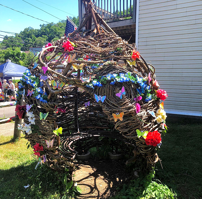 This whimsical garden structure, adorned with colorful butterflies, showcases Millvale's creative spirit and commitment to creating joyful public spaces for all ages.