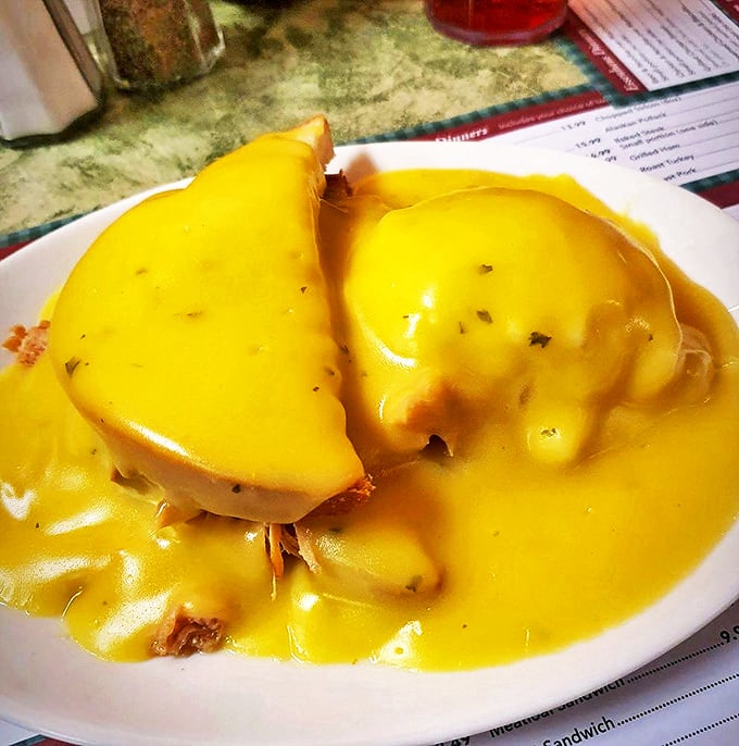 The legendary Turkey Manhattan—where turkey, potatoes, and gravy come together in an architectural marvel that would make Frank Lloyd Wright put down his blueprints and pick up a fork.