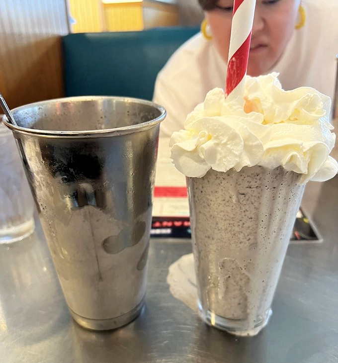 The milkshake that time forgot—gloriously topped with enough whipped cream to cause dairy farmers to high-five each other across America.