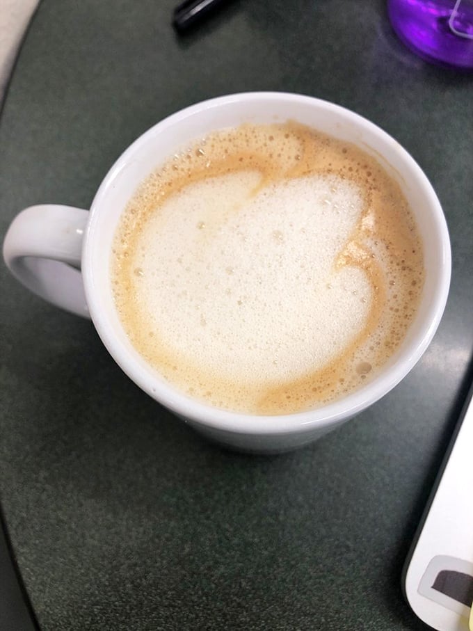 This latte isn't just coffee—it's morning meditation in a mug. The foam creates a canvas that says, "Today might actually be okay."