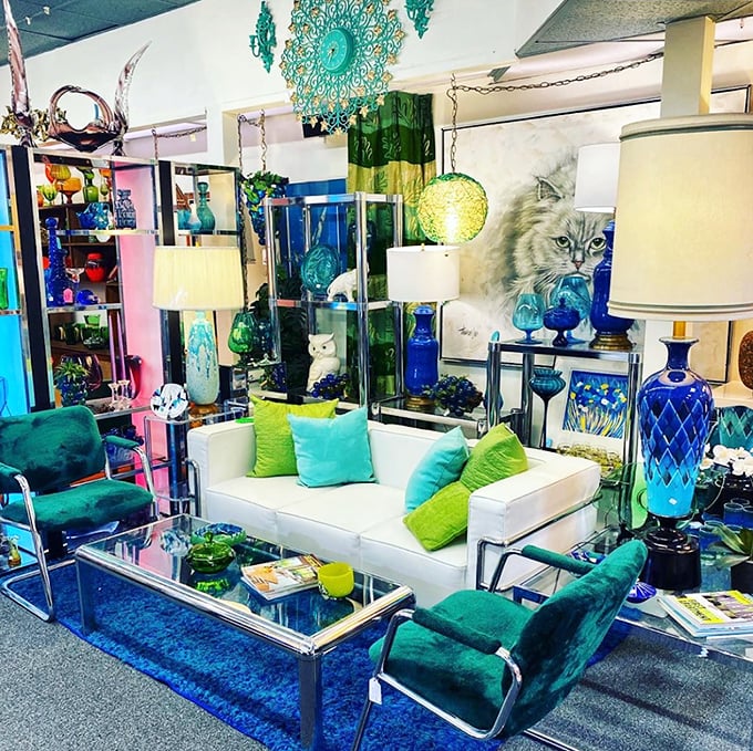 Blue and white perfection in this curated corner that would make any mid-century enthusiast weak in the knees. Not just furniture—it's functional art.