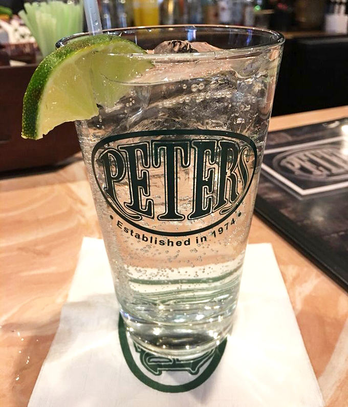 A crisp vodka soda in Peter's signature glass with a lime wedge—sometimes the simplest pleasures are the most refreshing.