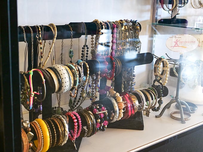Jewelry and accessories displayed like artifacts in a museum of personal style. One woman's discarded bracelet is another's vintage treasure.
