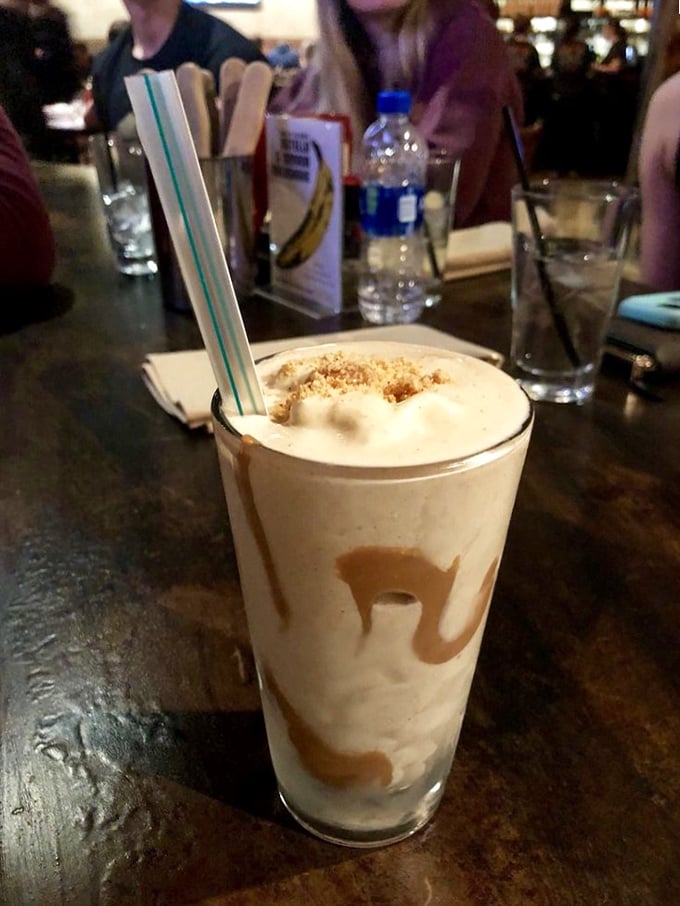 This isn't just a milkshake—it's dessert with a straw, caramel swirls dancing through vanilla like they're auditioning for "So You Think You Can Drizzle."