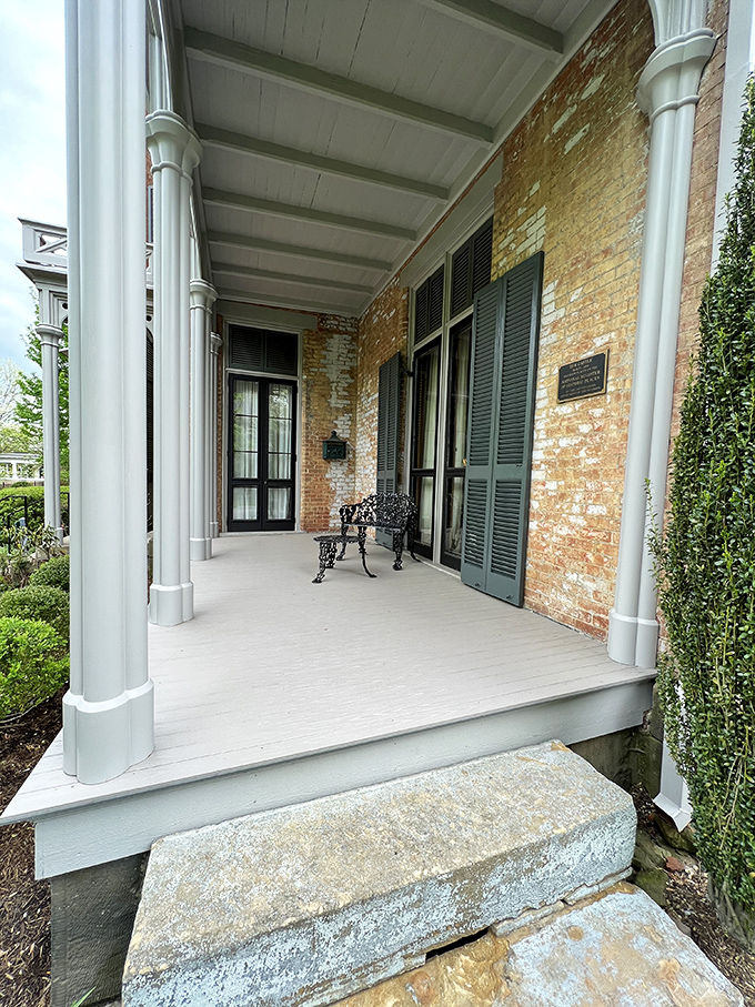 The front porch—where Victorians perfected the art of sitting elegantly while judging neighbors long before social media made it convenient.