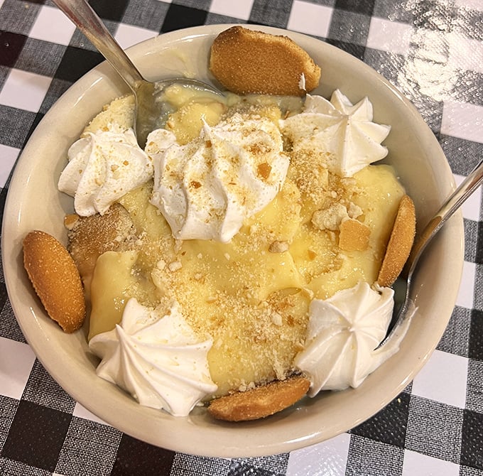 Banana pudding that doesn't just satisfy your sweet tooth—it throws a party for it. Those vanilla wafers aren't just garnish; they're essential supporting characters.