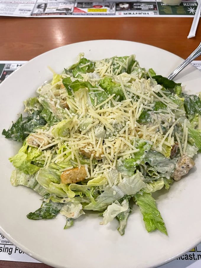 Even the Caesar salad gets the diner treatment—generous, unpretentious, and topped with enough cheese to make a Roman emperor blush.