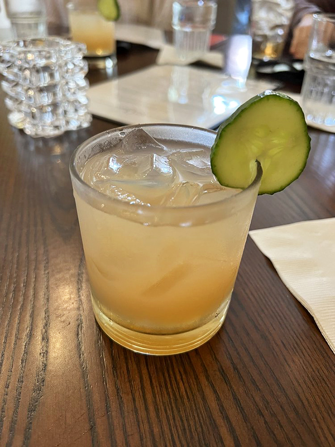 A refreshing Charleston cocktail that says "vacation" with every sip. That cucumber garnish isn't just pretty—it's a promise of southern refreshment