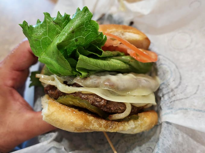 This isn't just a cheeseburger—it's edible proof that perfection doesn't require fancy ingredients, just decades of knowing exactly what works.