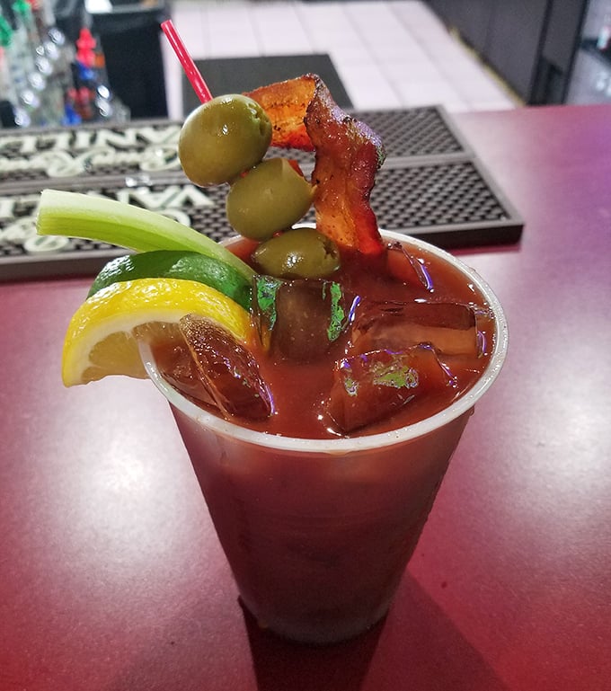 This isn't just a Bloody Mary—it's a liquid salad with attitude. The bacon garnish isn't showing off; it's simply living its best life.