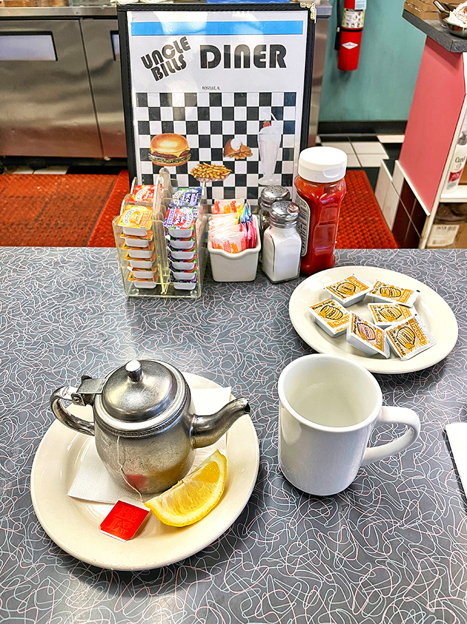 The diner condiment caddy—civilization's greatest achievement since indoor plumbing, ensuring no meal goes under-seasoned.