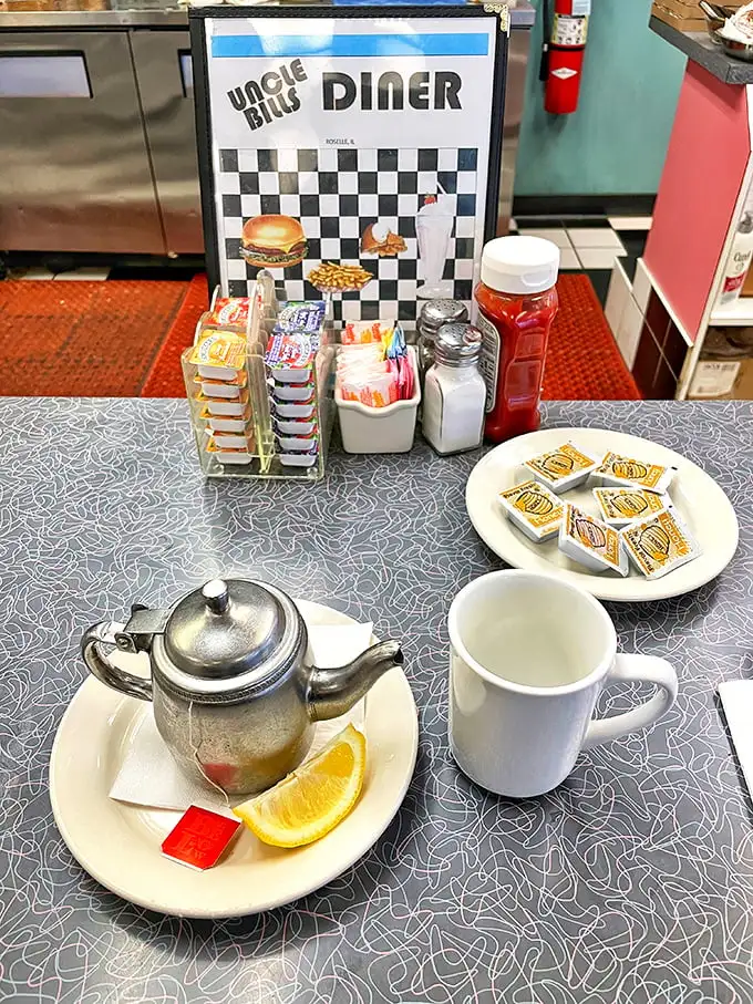 The diner condiment caddy—civilization's greatest achievement since indoor plumbing, ensuring no meal goes under-seasoned.
