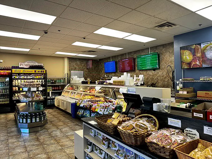 The counter area – where sandwich dreams come true. Those display cases hold more potential happiness than most amusement parks.