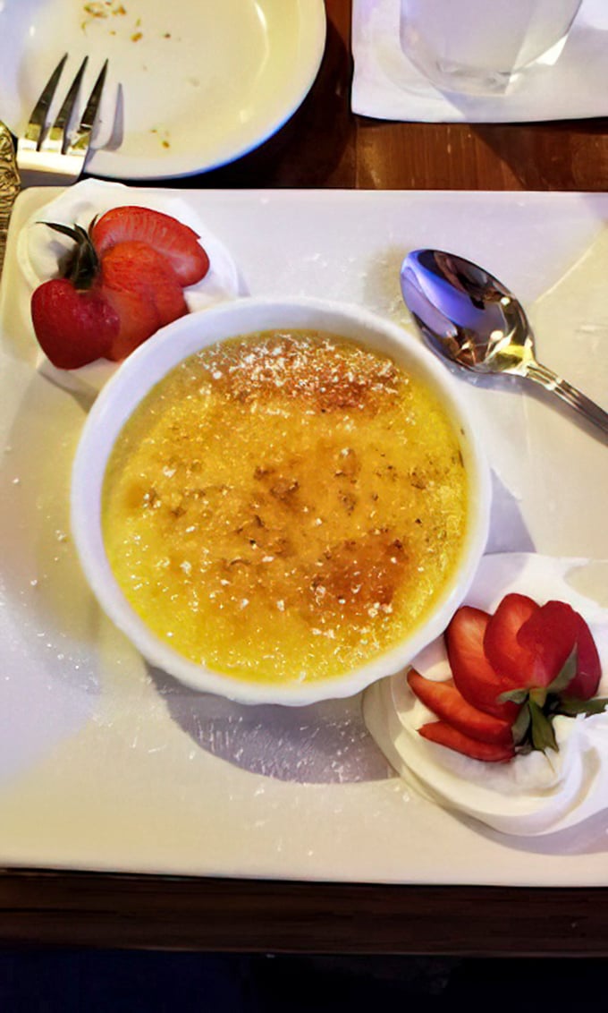 The crème brûlée's perfectly torched sugar top waits to be cracked like thin ice on a winter pond—a sweet finale worth saving room for.