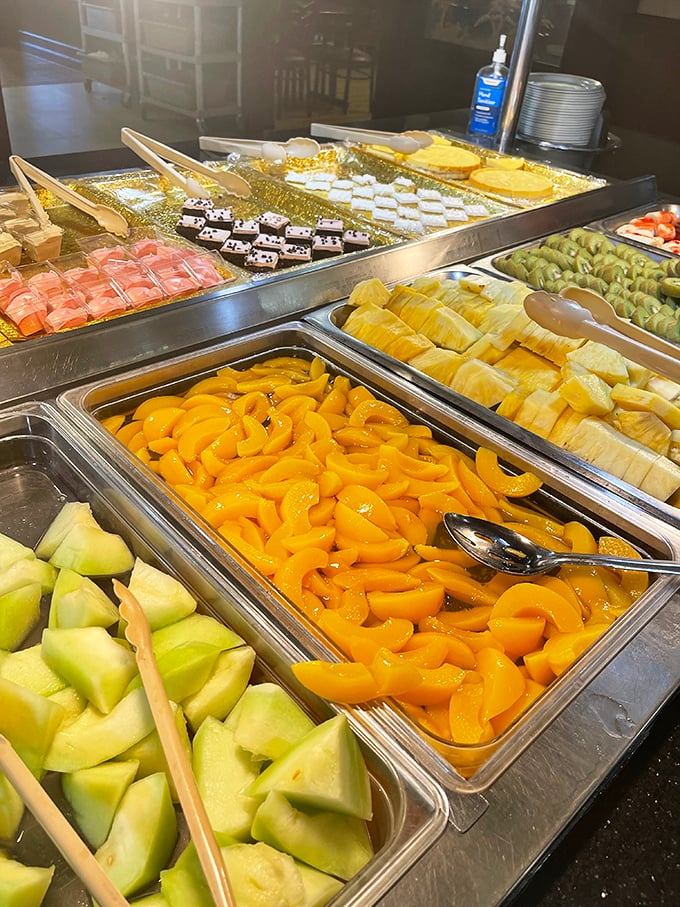 Fresh fruit and desserts: where the "I'll just have a light ending" promise goes to die beneath mountains of honeydew, pineapple, and mandarin oranges.