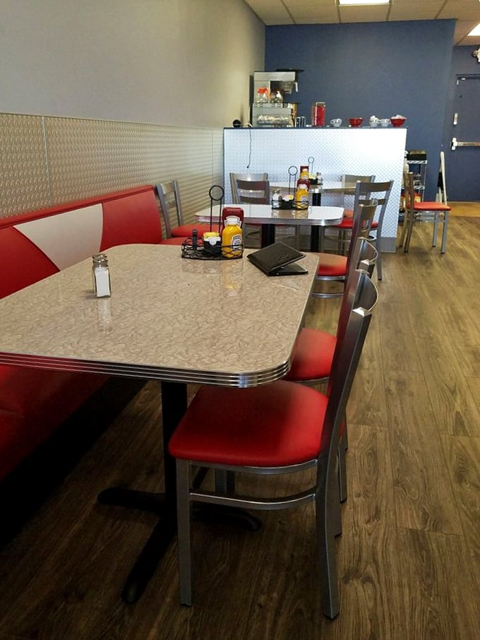 Retro-modern diner design that says "stay awhile." Those marble-pattern tables have supported many elbows deep in breakfast conversation.