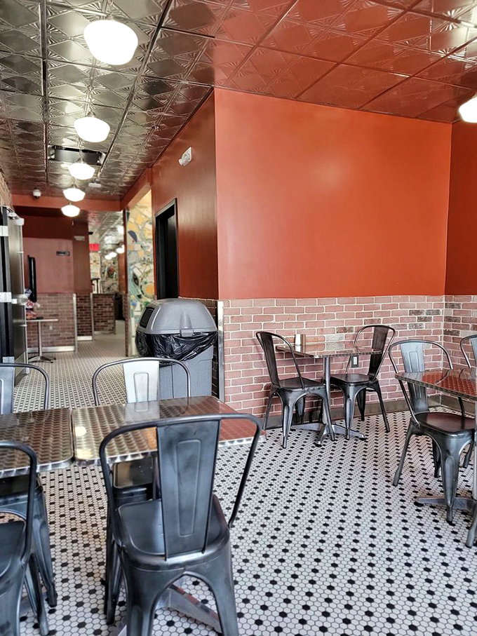 The dining area offers front-row seats to South Street's colorful parade of humanity – the perfect backdrop for your cheesesteak experience.