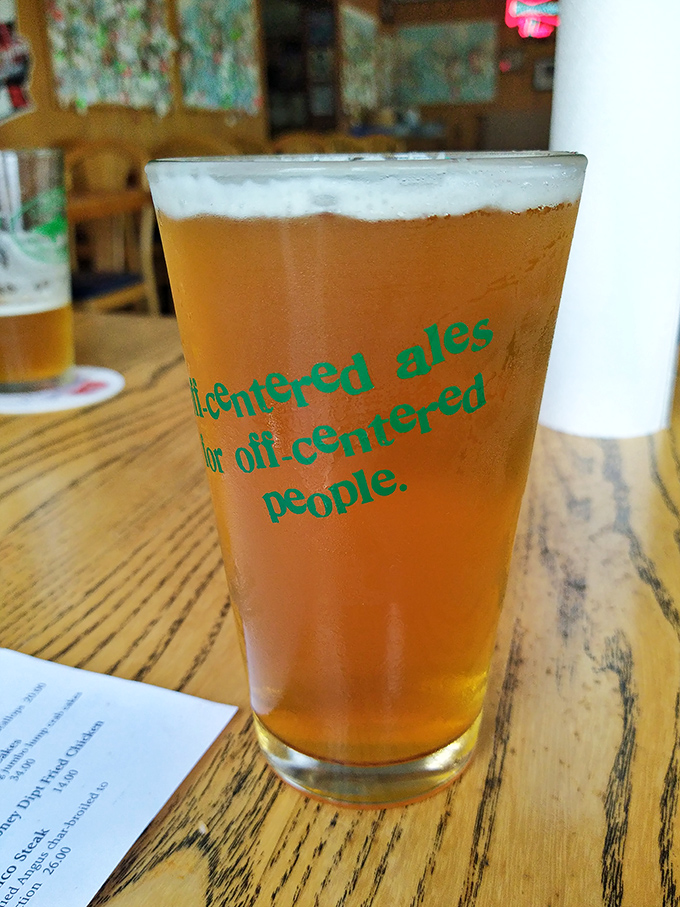 That beer glass wisdom speaks truth: "Filtered ales for off-centered people" – finally, a place that gets it right.