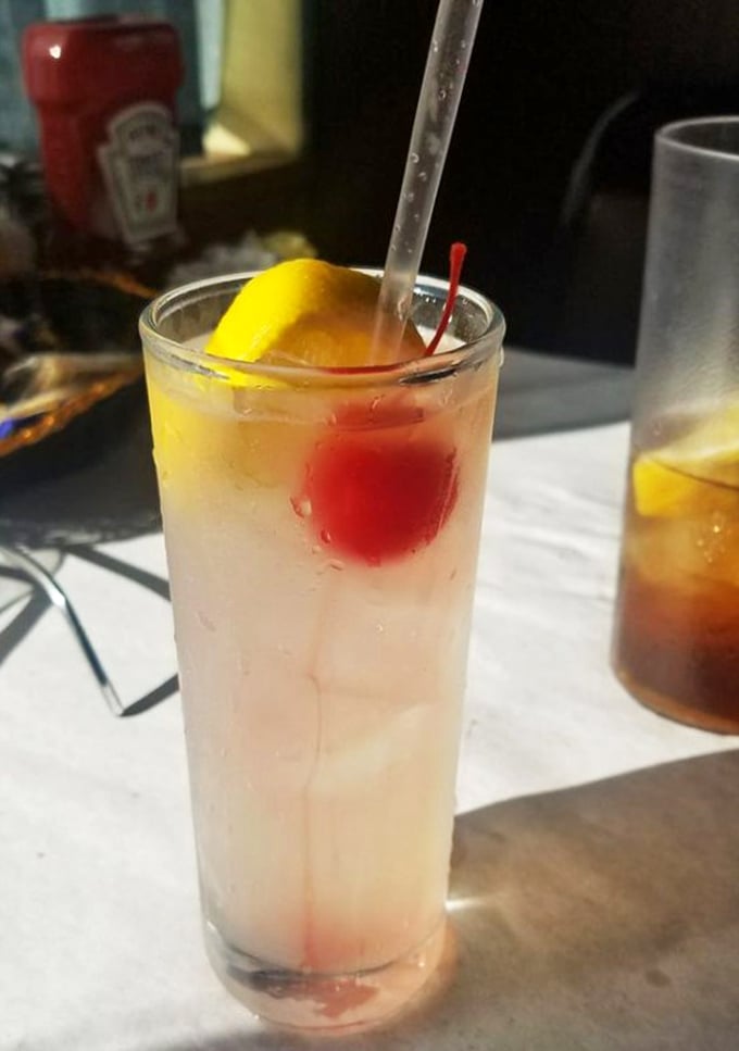 The classic Shirley Temple – proof that sometimes the non-alcoholic option brings just as much joy as its spirited cousins.