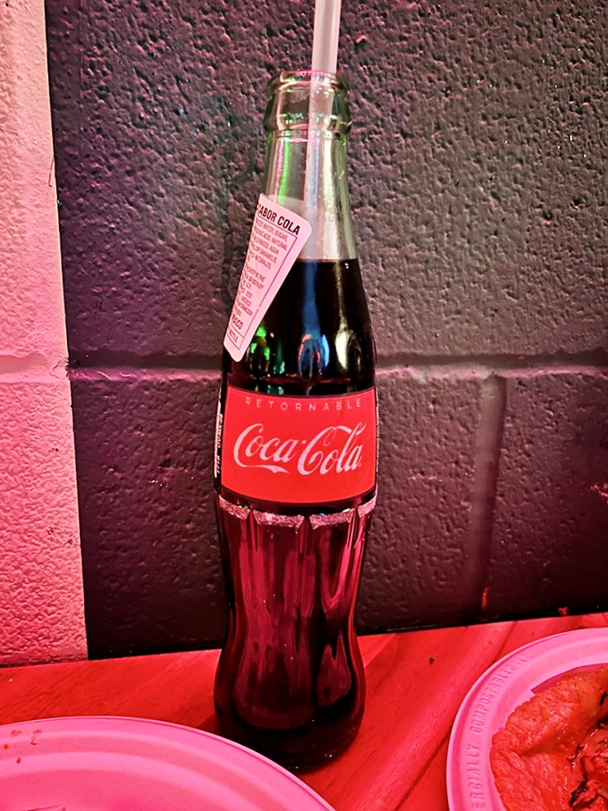 The Mexican Coca-Cola in its iconic glass bottle—made with real sugar and somehow tasting like both nostalgia and vacation simultaneously.