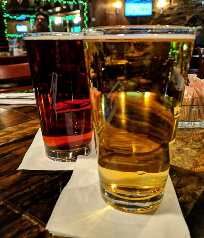 Cold beer on a wooden table—sometimes the simplest pleasures are the most satisfying. The perfect companion to whatever deliciousness you've ordered.