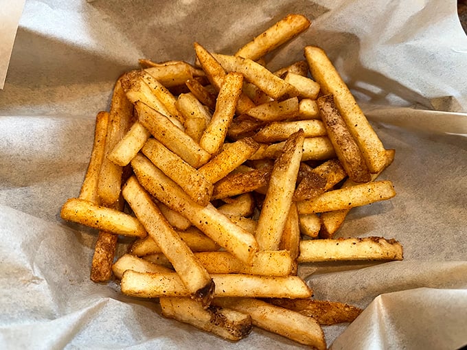 These aren't just french fries—they're golden vessels for delivering that perfect blend of salt, seasoning, and potato directly to your happiness center.