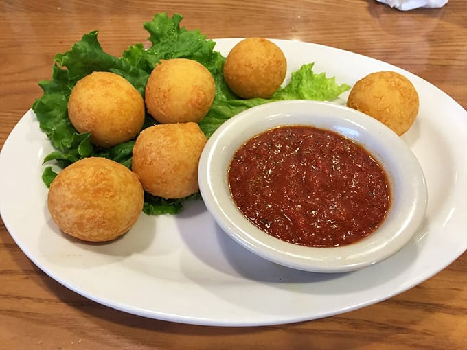 These golden-fried cheese balls aren't just appetizers—they're little spheres of joy that make waiting for your main course a pleasure, not a chore.