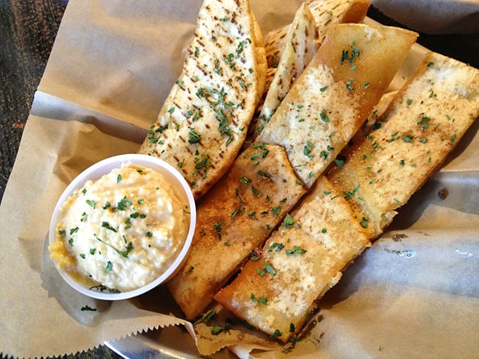 Fried pita strips with tzatziki – the Mediterranean answer to chips and dip that'll make you wonder why you ever settled for tortilla chips.