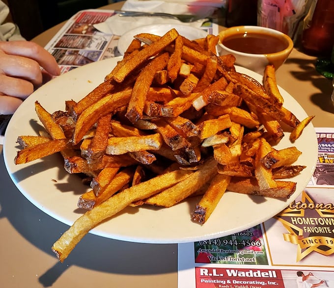 These aren't just fries – they're potato perfection, hand-cut with crispy exteriors and fluffy interiors that make ketchup optional but highly recommended.