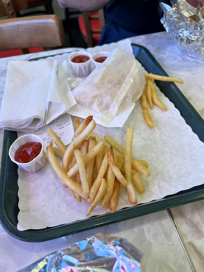 Golden fries, crisp outside and fluffy inside, presented without pretension. Some culinary pleasures need no improvement, just appreciation.