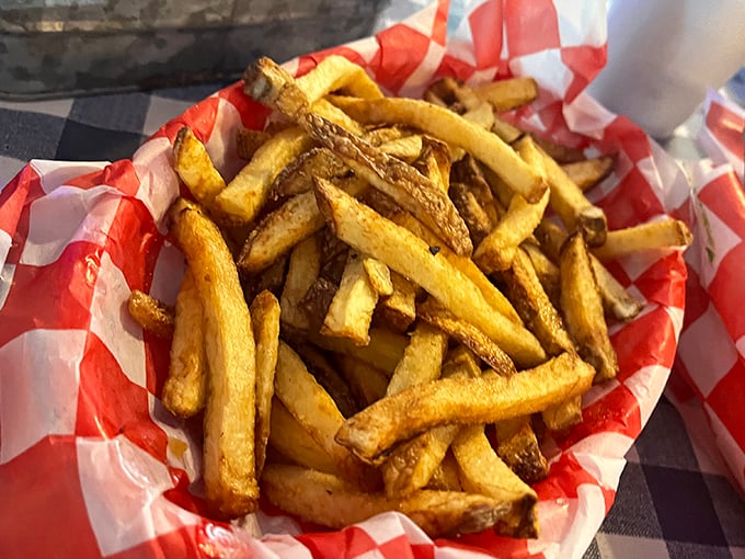 Hand-cut fries with that perfect balance of crispy exterior and fluffy interior. Potato perfection worth every mile of the drive.