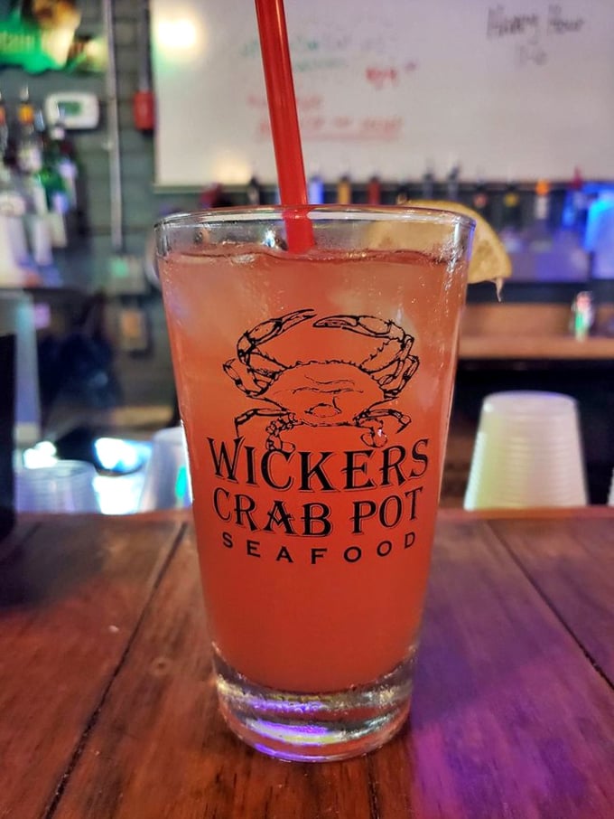 A signature Wicker's drink in its natural habitat—waiting to wash down whatever seafood treasure you've chosen. That crab logo is basically a quality seal.