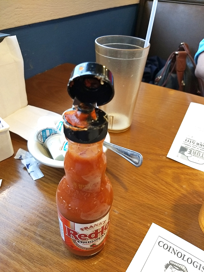 Frank's RedHot sauce—the condiment equivalent of that reliable friend who always shows up when needed. A classic American flavor enhancer.