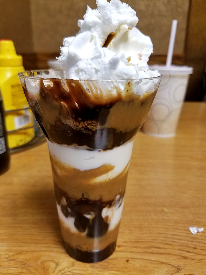 Their layered sundae proves Hot Dog Heaven isn't just about savory delights—this tower of ice cream, fudge, and whipped cream offers the perfect sweet finale.