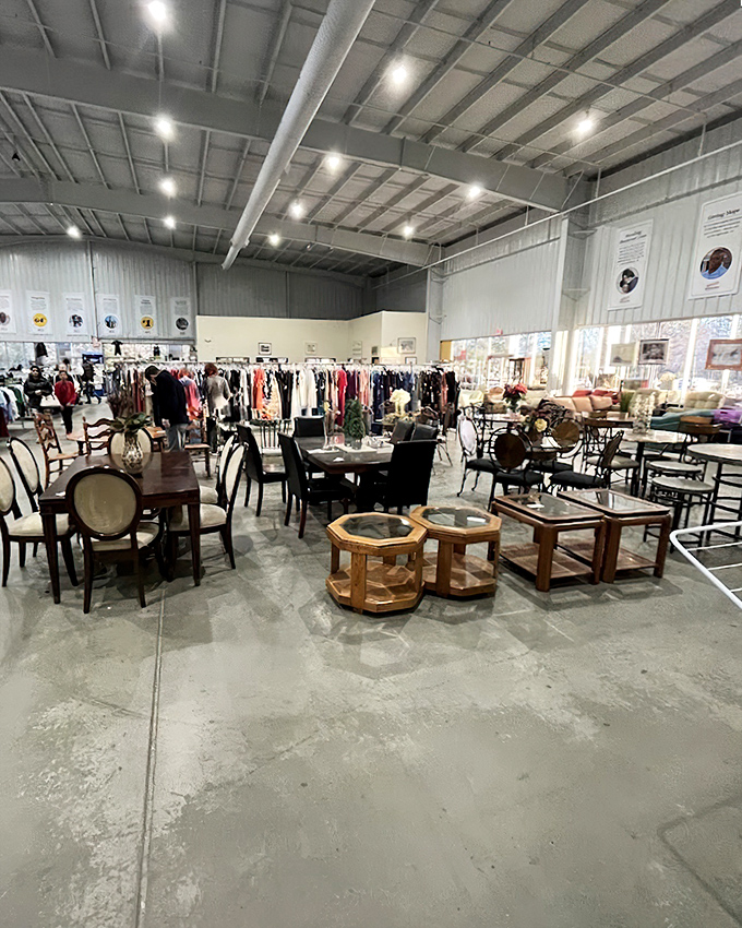 The vastness of the interior reveals itself—clothing racks to the horizon, furniture islands creating a thrifter's archipelago of possibility.