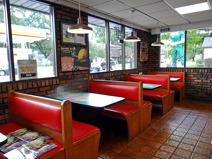 Inside the Launching Pad, red vinyl booths and brick walls create the perfect setting for contemplating intergalactic travel over lunch.