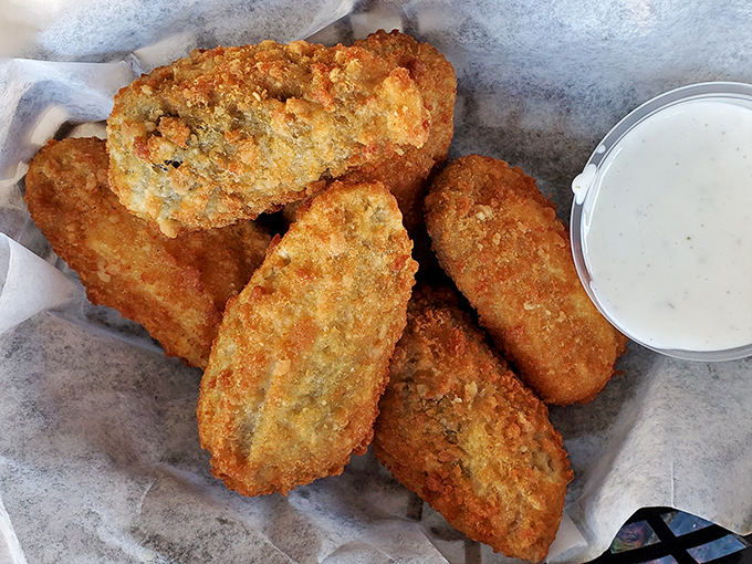Crispy on the outside, molten cheese explosion on the inside. These jalapeño poppers are the spicy sidekick your burger deserves.