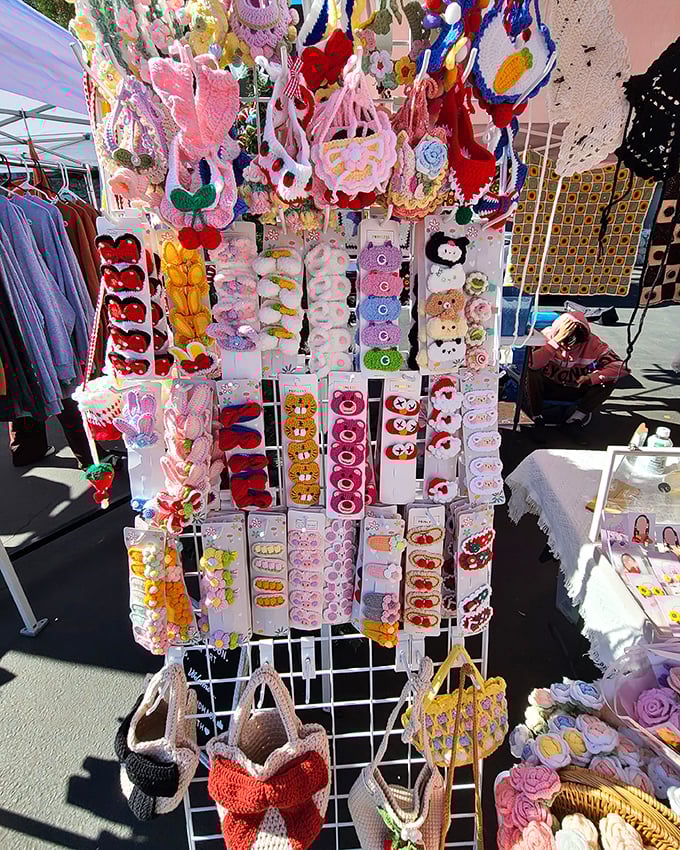 Handcrafted joy on display—these colorful crocheted treasures transform ordinary outfits into conversation starters faster than you can say "handmade."