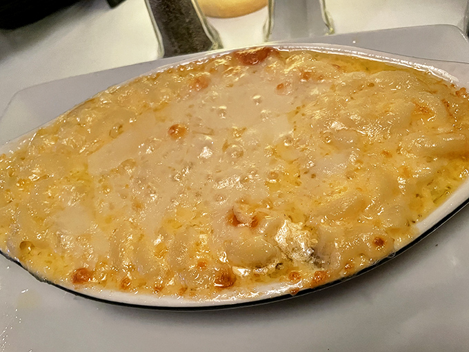 Mac and cheese that's achieved the perfect golden crust—a bubbling cauldron of comfort that makes you want to cancel all other dinner plans.