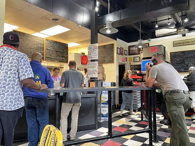 The ordering counter: where hot dog dreams come true. The anticipation in the air is thicker than their chili topping.