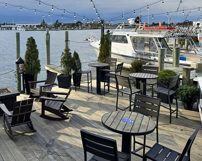 Waterfront dining that feeds your soul and your stomach. With boats bobbing nearby, even the chairs seem to relax into the coastal vibe.