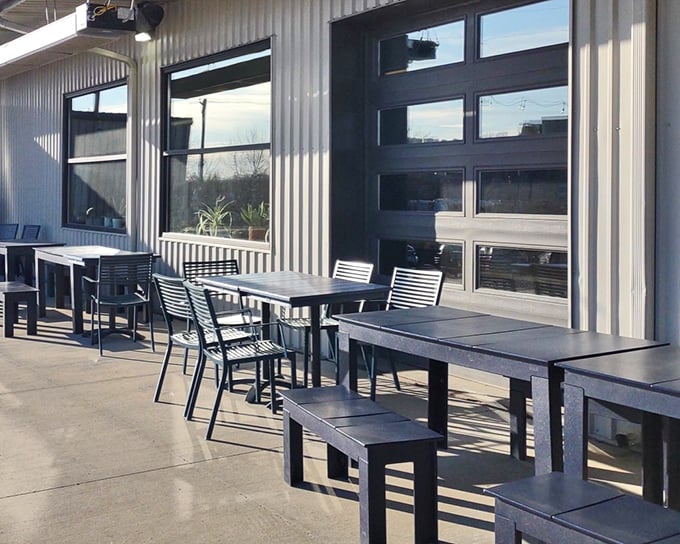 Modern outdoor seating proves even classics can evolve – though purists know the real magic happens inside, where the cocktails flow freely.