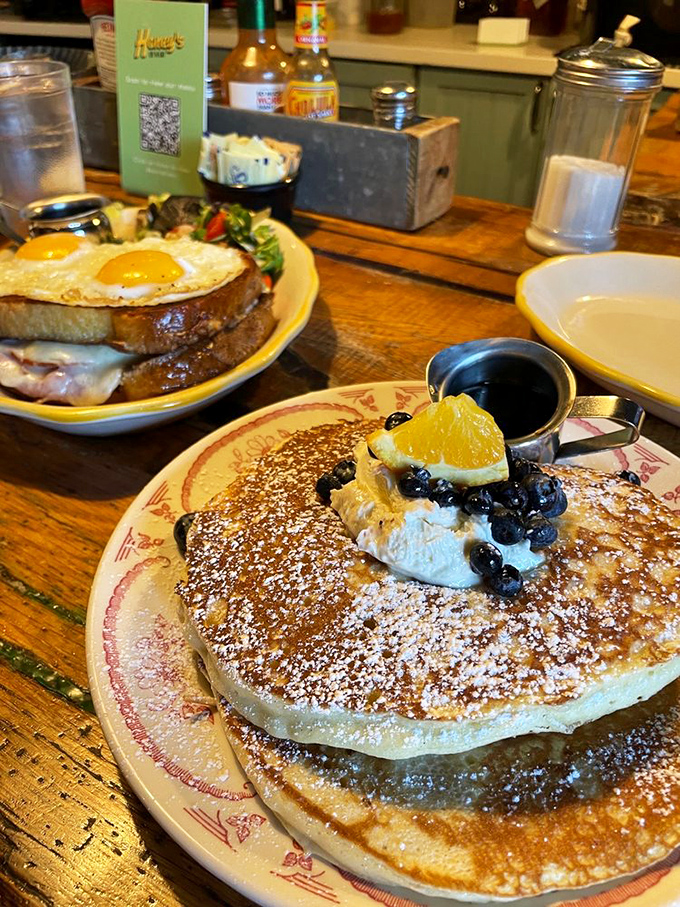 Pancakes topped with fresh blueberries and whipped cream – the breakfast equivalent of getting an unexpected tax refund on a Monday.
